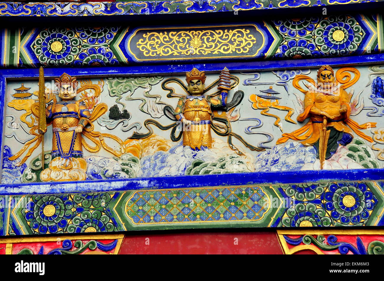 Sui Ning, China: Carved painted figures decorate a panel on the great ...