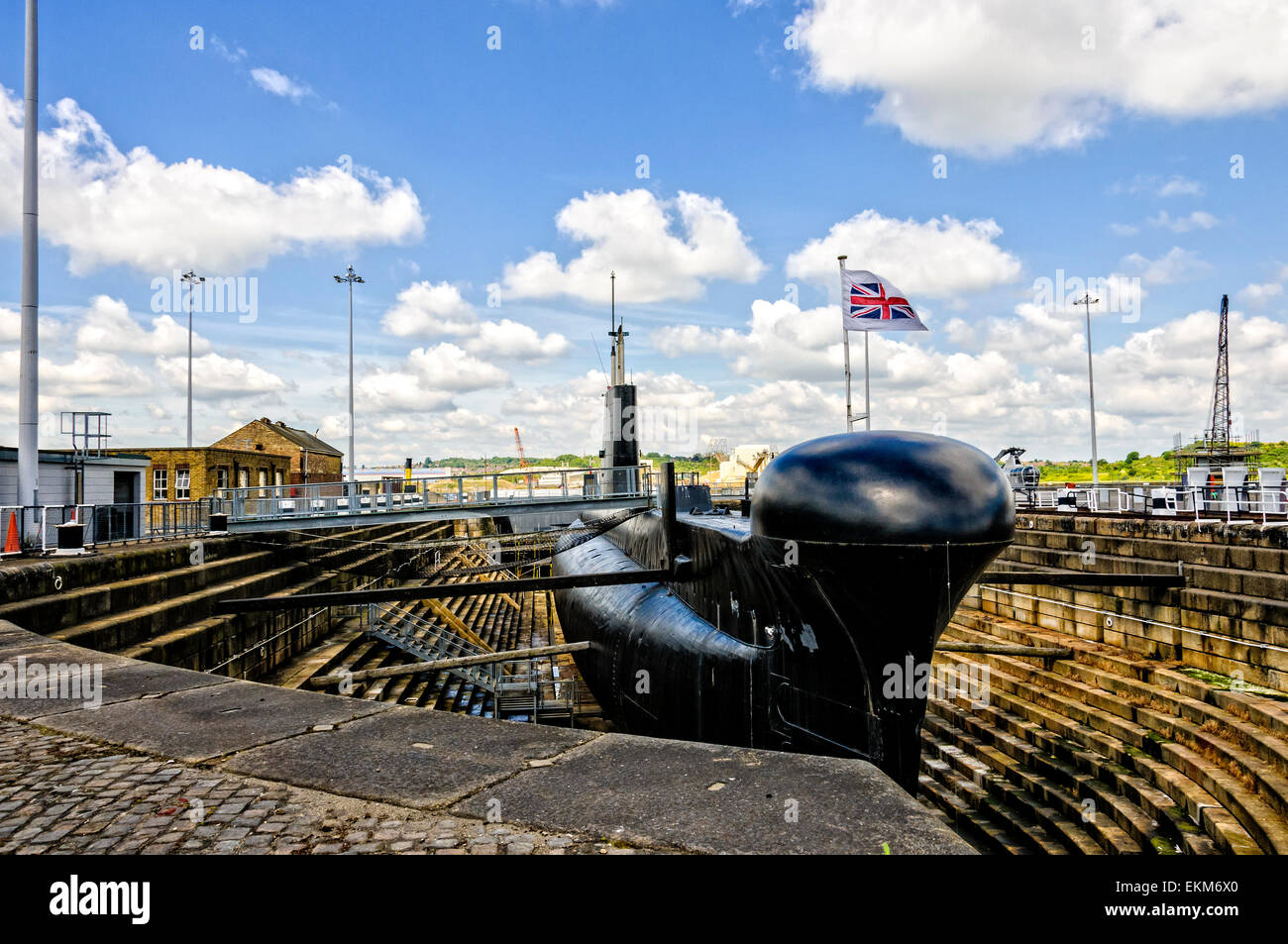 A bulbous sonar dome at the bow and a tall slim tower carrying ...