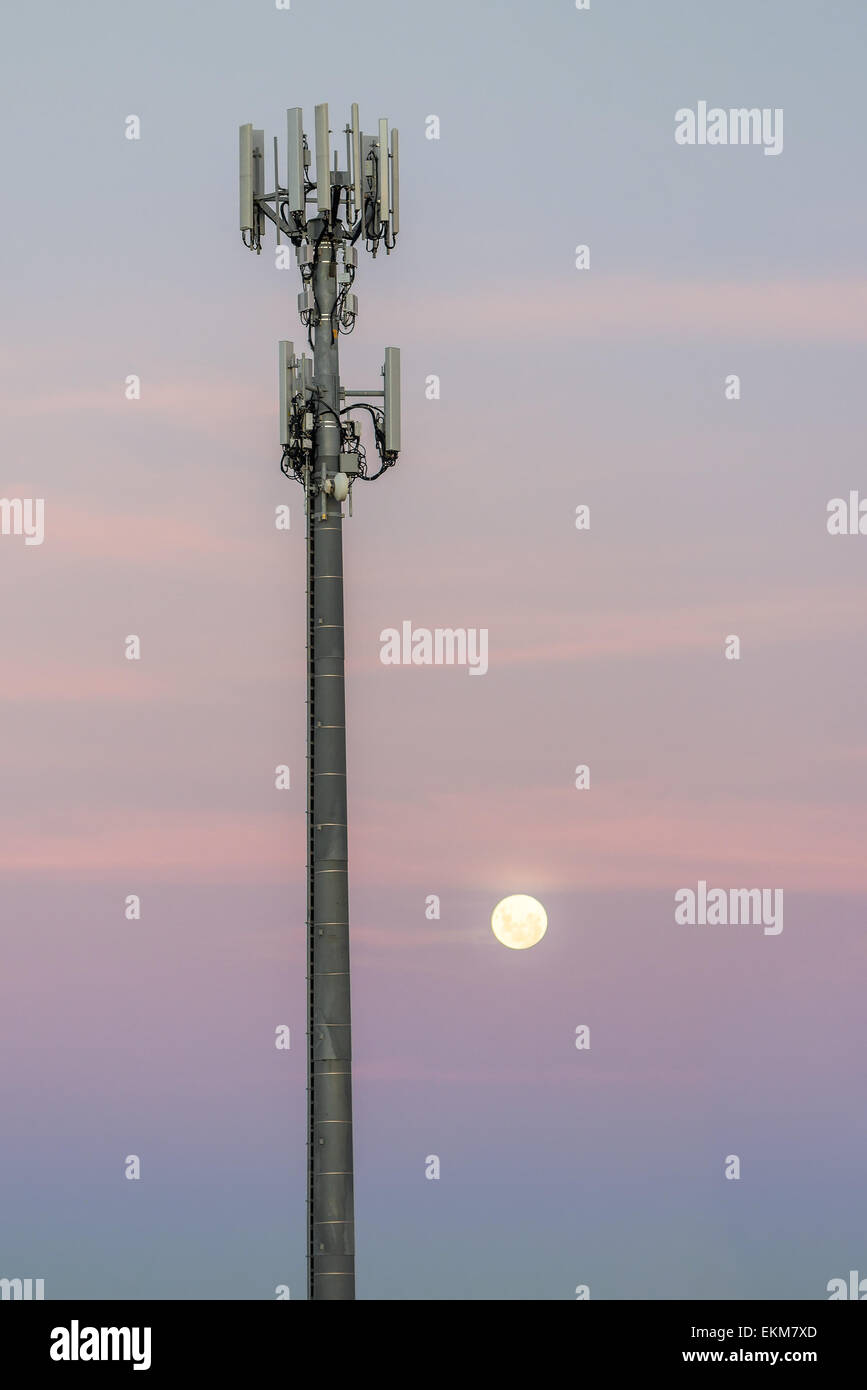 Cellular radio tower at dusk Stock Photo - Alamy
