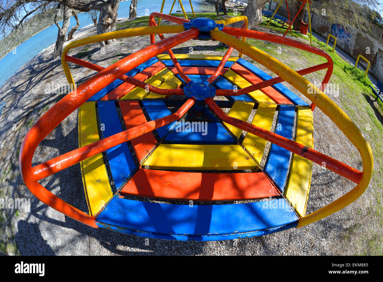 Children merry go round playground hi-res stock photography and images ...