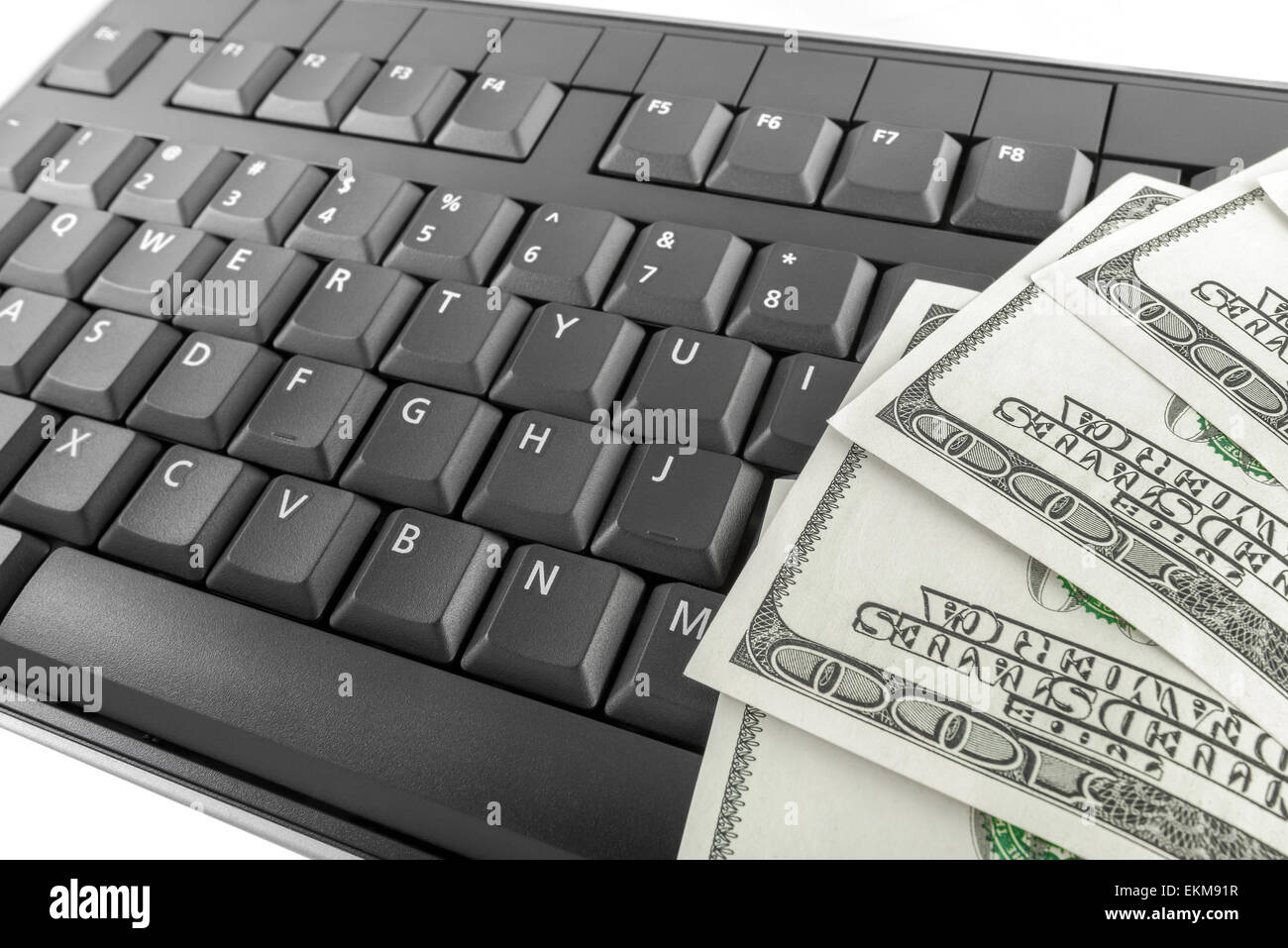 Dollar bill on keyboard hi-res stock photography and images - Alamy