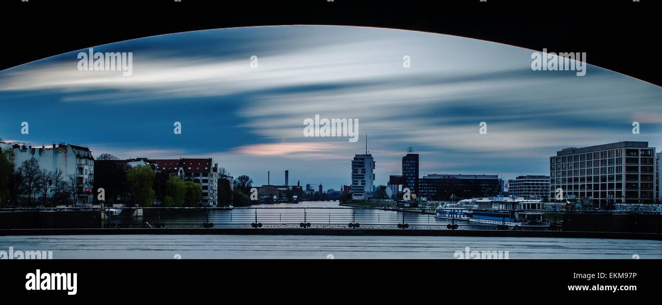 Berlin, Germany. 11th Apr, 2015. The arch of the Oberbaum bridge frames ...
