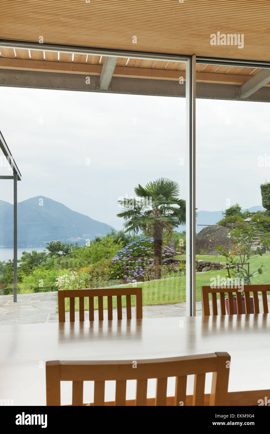 Interior, modern house, garden view from the dining table Stock Photo ...