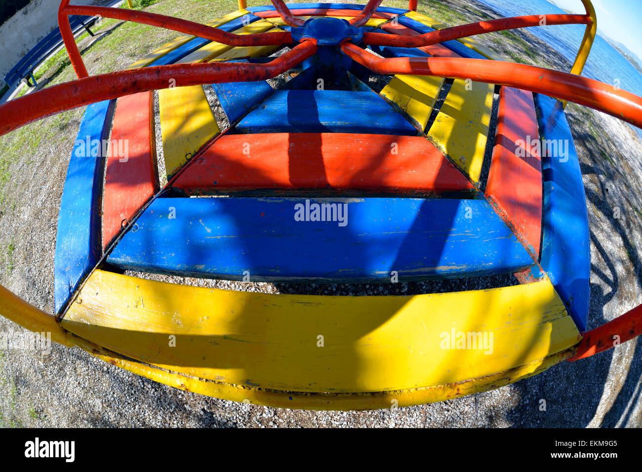 Merry-go-round in children playground Stock Photo - Alamy