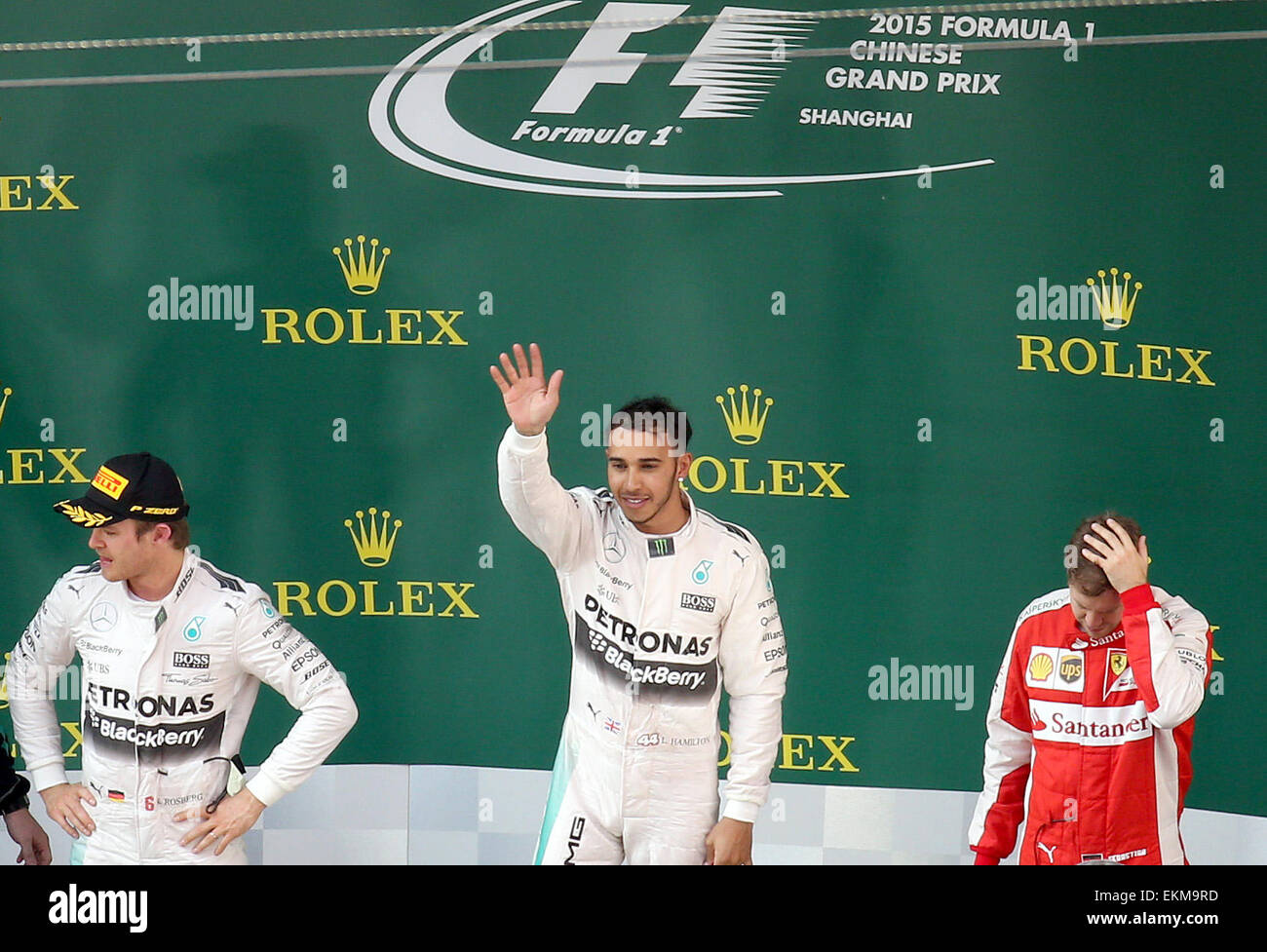 Shanghai, China. 12th Apr, 2015. Mercedes AMG driver Lewis Hamilton (C ...