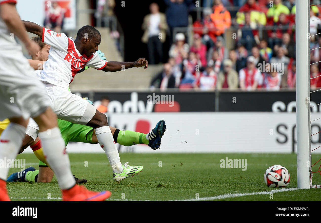 Cologne, Germany. 12th Apr, 2015. Cologne's Anthony Ujah (L) hits the ...