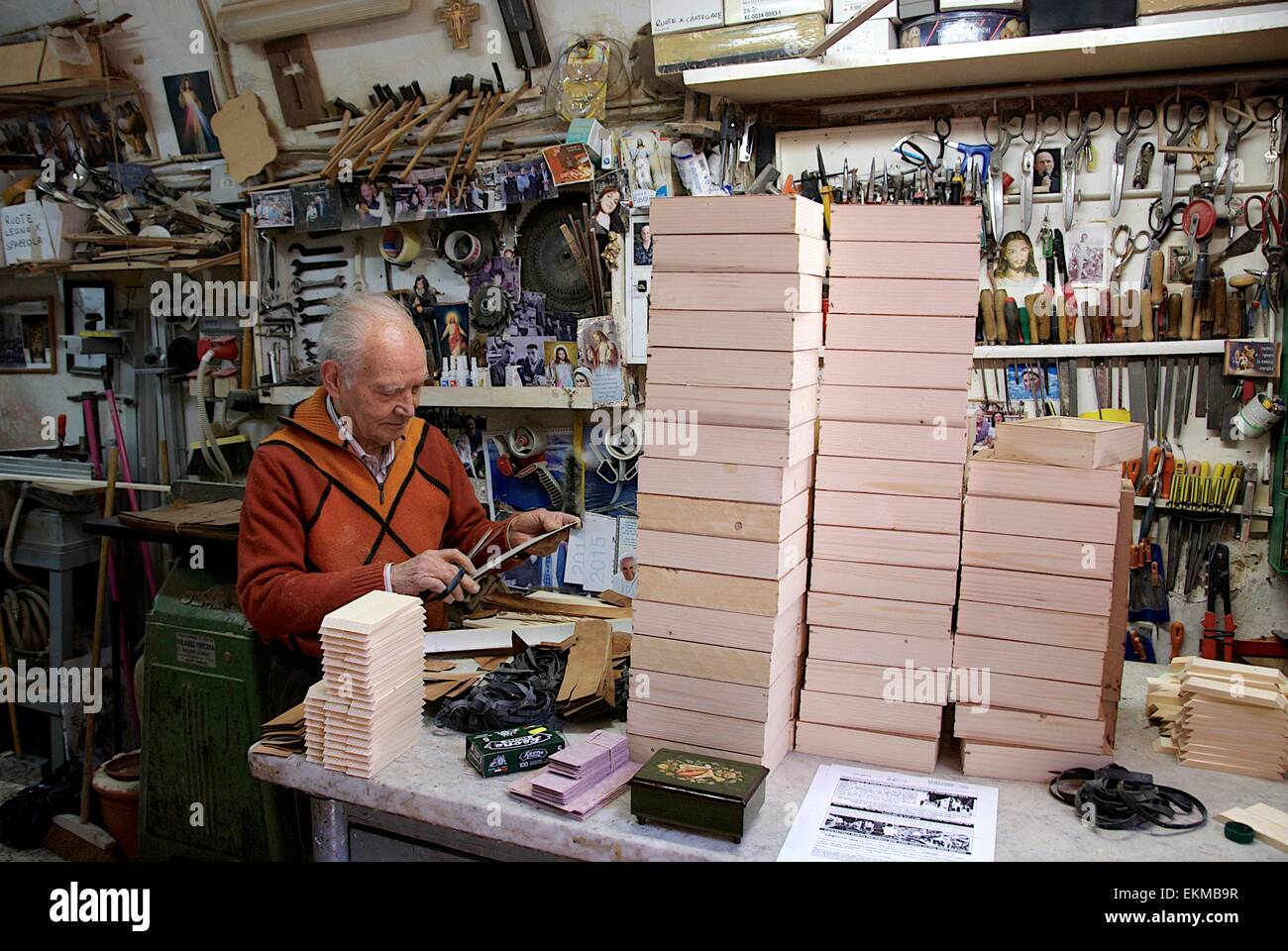 Traditional box maker in Sorrento, Italy, at work in his workshop with ...