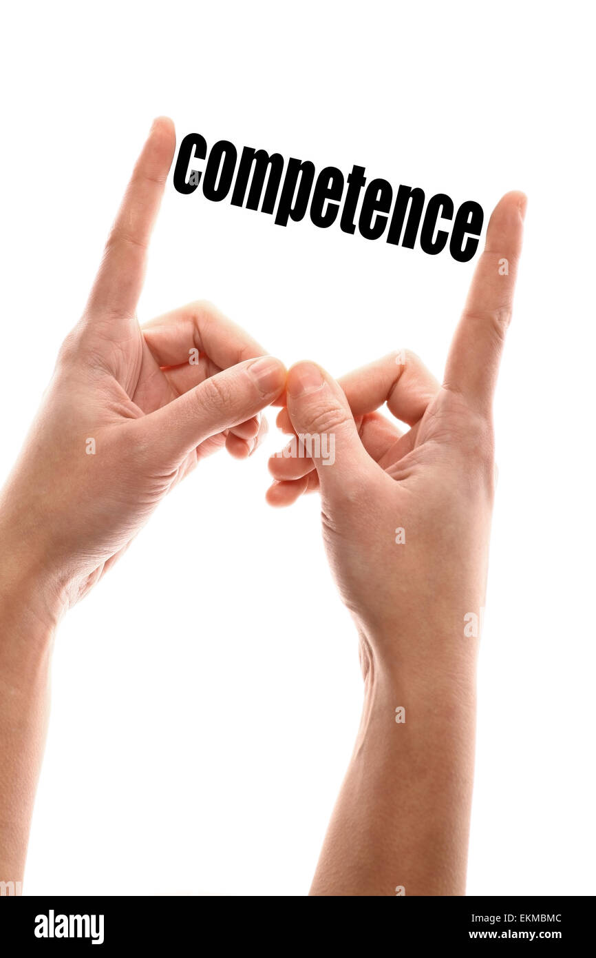Color vertical shot of two hands squeezing the word "competence Stock ...