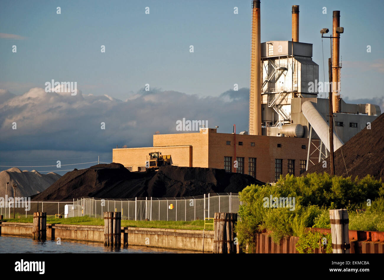 Coal piles by industrial factory on the waterfront in Michigan Stock ...