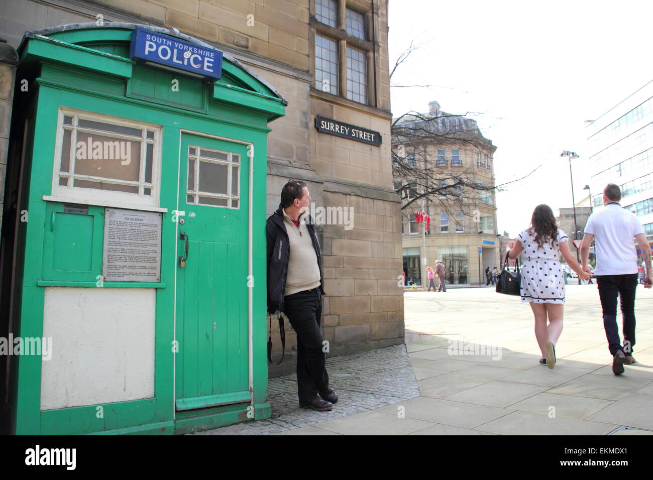 People by the green police box on Surrey Street in Sheffield's city ...
