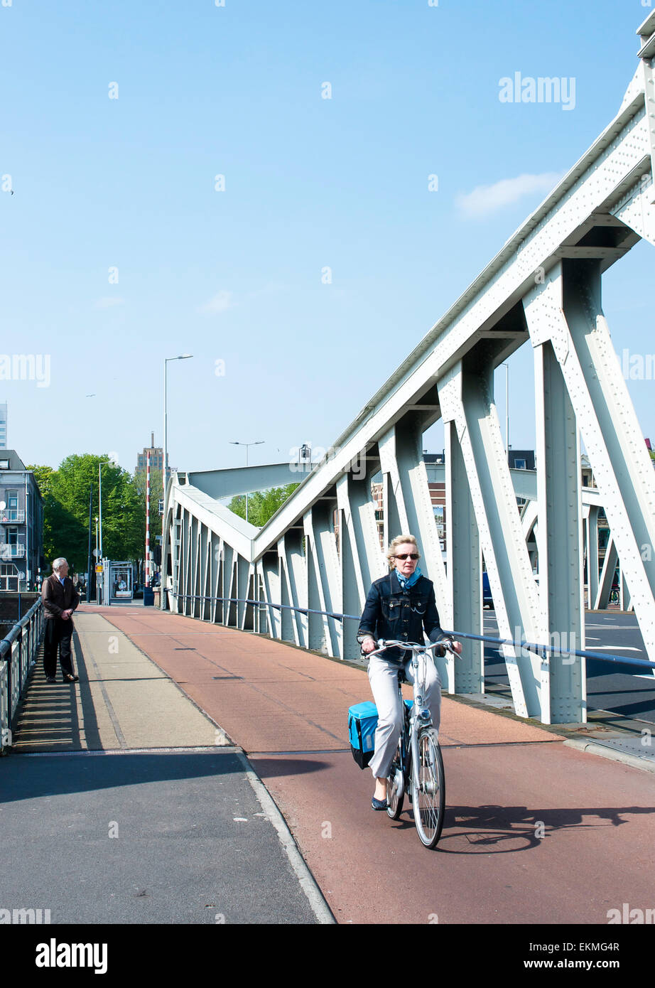 Woman riding bicycle netherlands hi-res stock photography and images ...