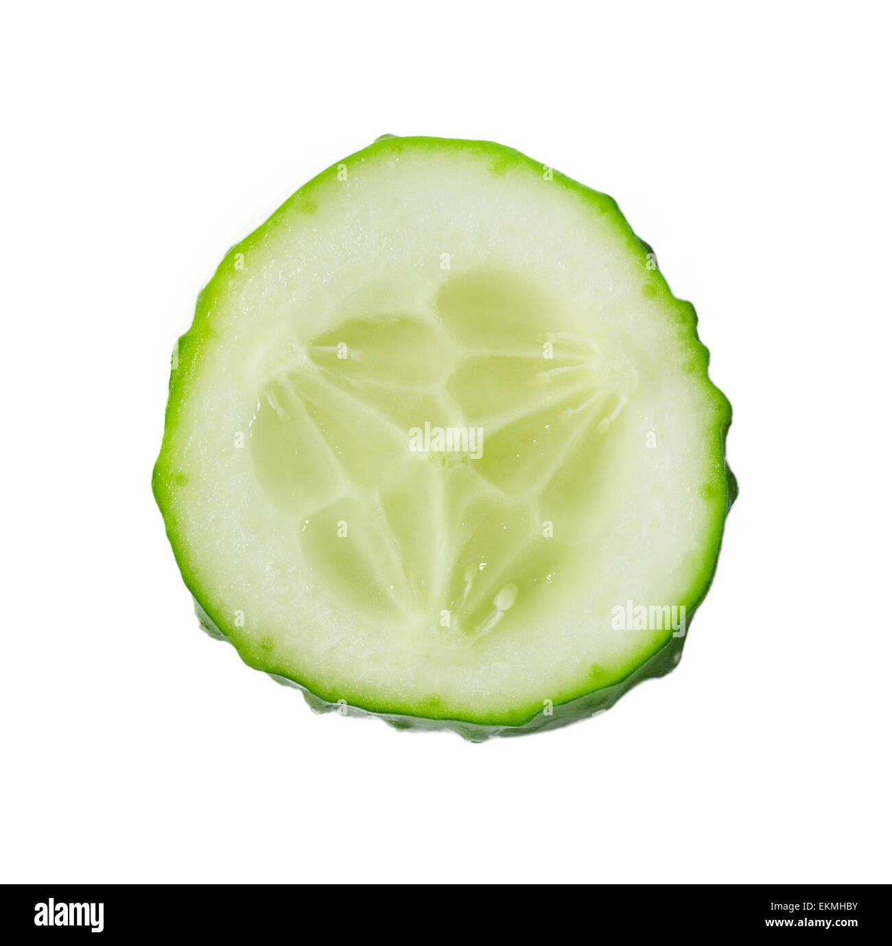 Slice cucumber in the macro scale. Isolated background Stock Photo - Alamy