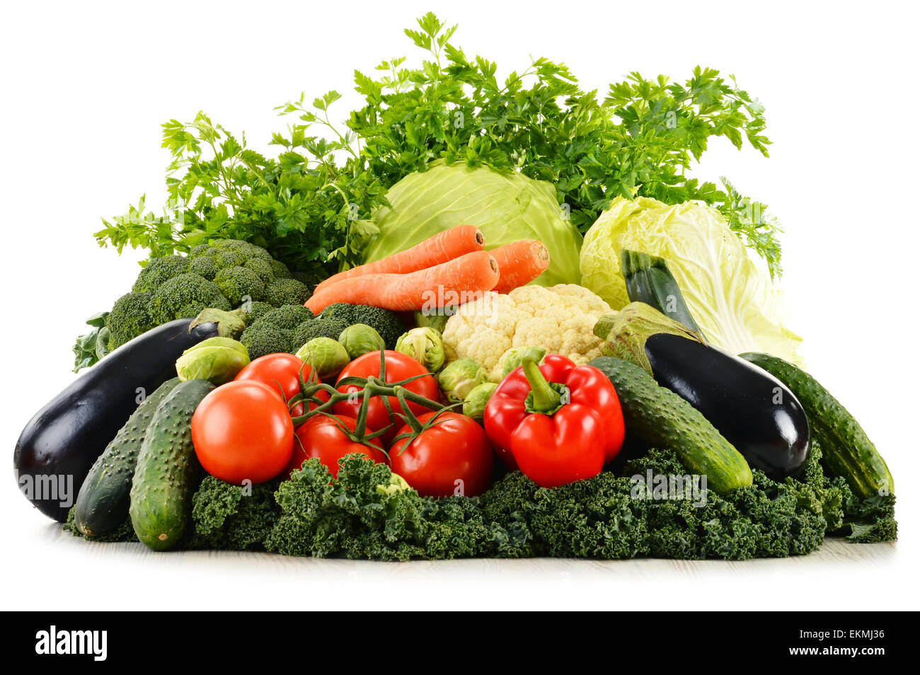Composition with assorted raw organic vegetables isolated on white ...
