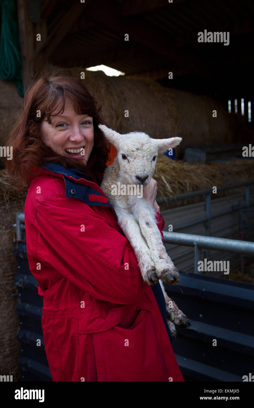 Female holding lamb hi-res stock photography and images - Alamy