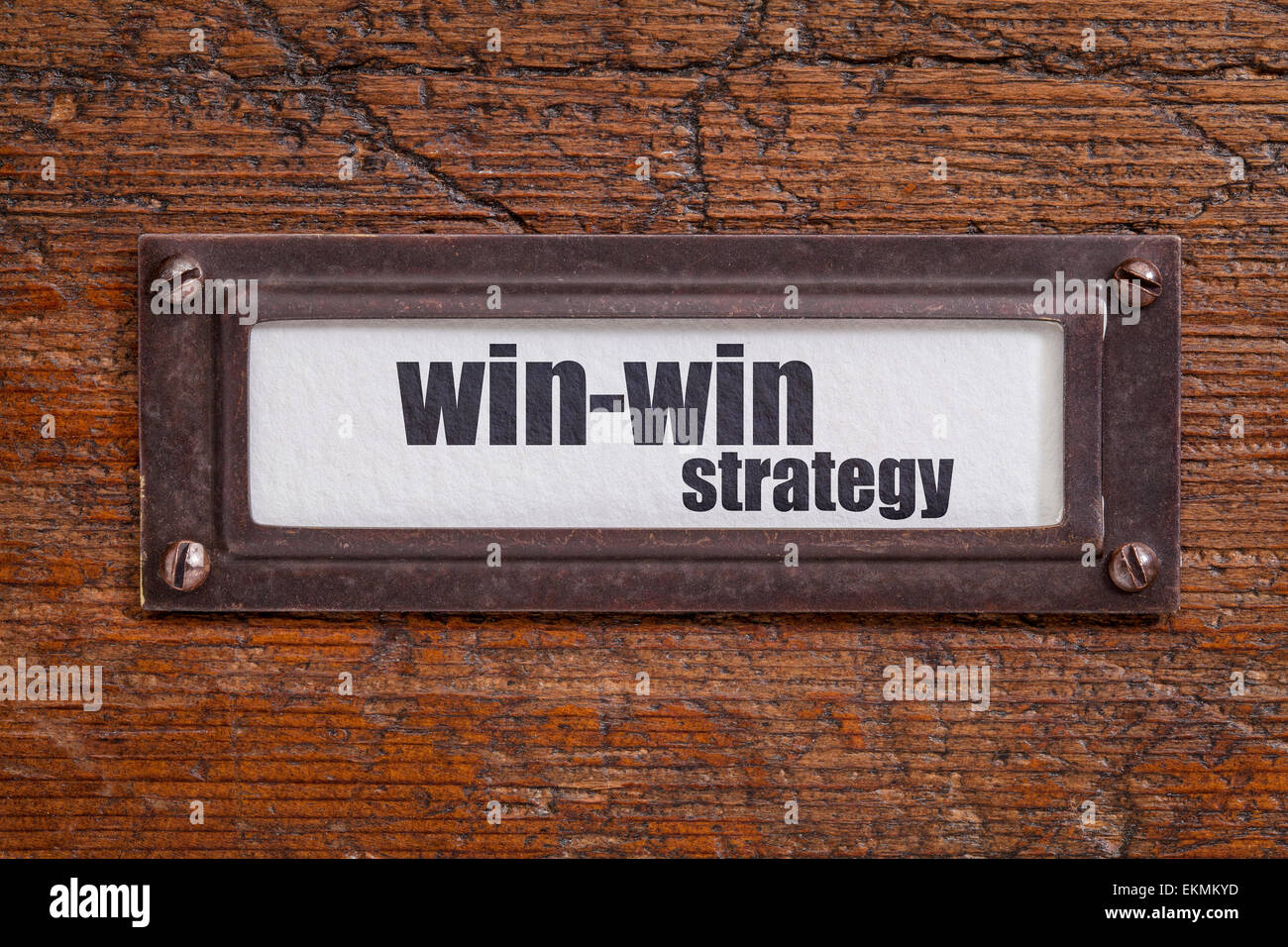 win-win strategy - file cabinet label, bronze holder against grunge and ...
