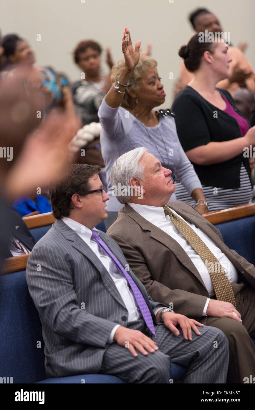 North Charleston Mayor Keith Summey listens to Rev. Al Sharpton ...