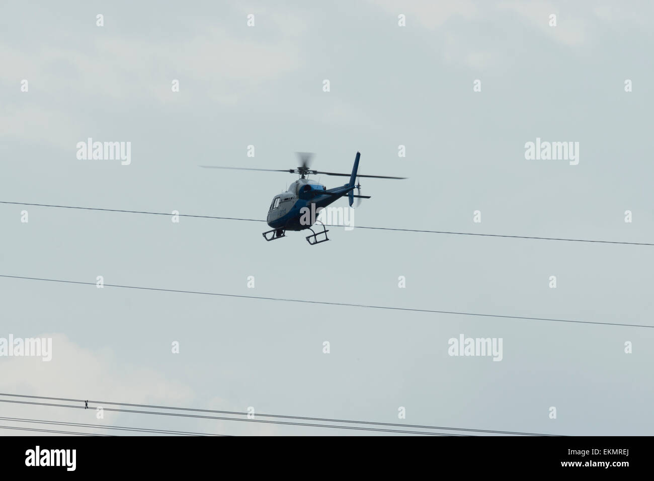 National Grid Inspecting power lines helicopter Stock Photo - Alamy