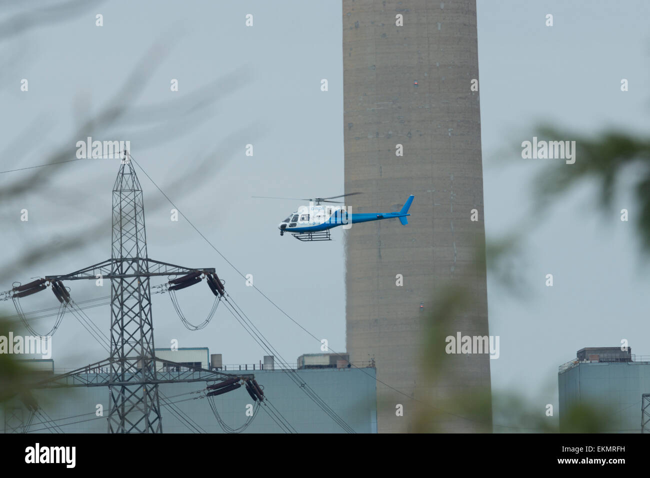 National Grid Inspecting power lines helicopter Stock Photo - Alamy