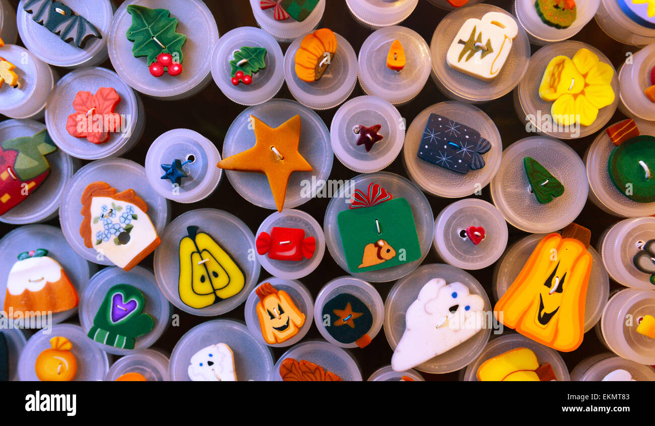 Whimsical colors and designs in buttons on display in a craft store ...