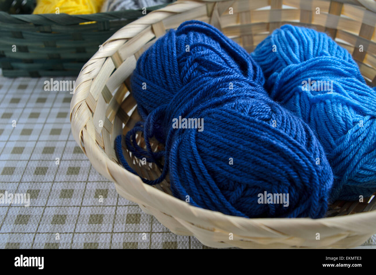 Blue yarn balls in basket Stock Photo - Alamy