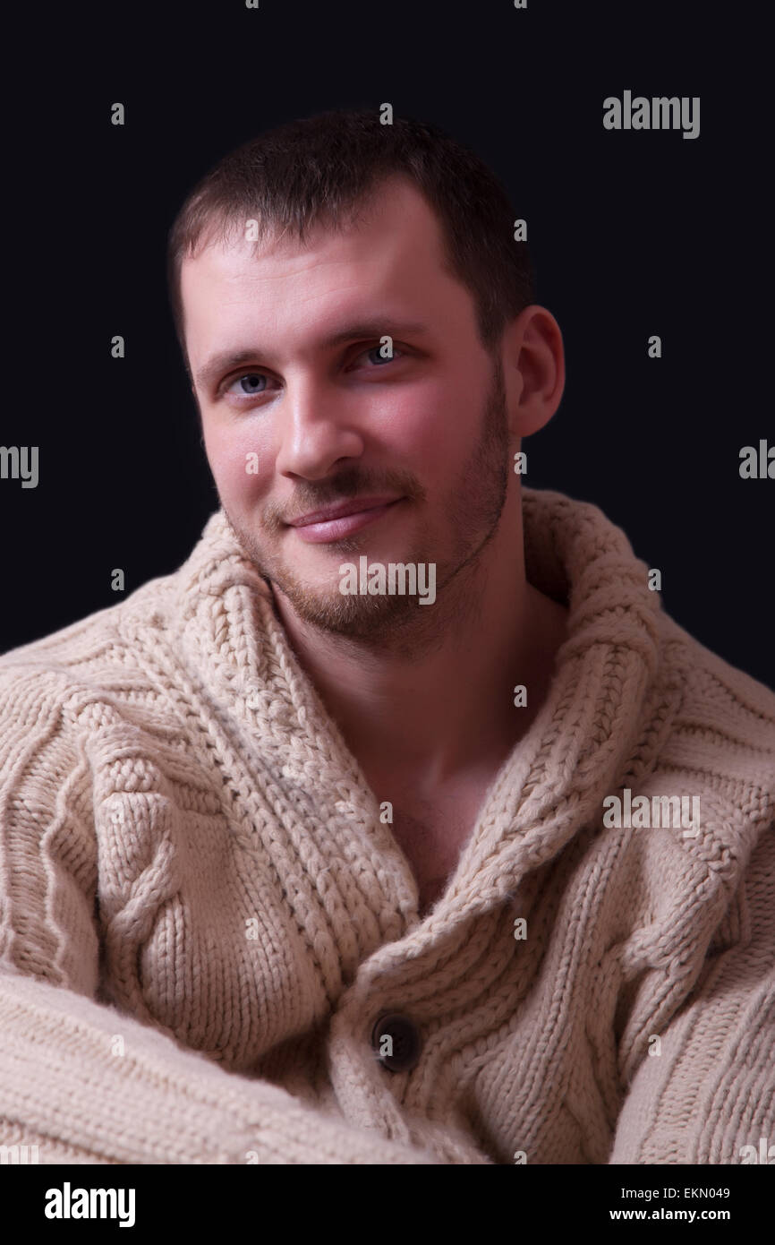 Portrait of a beautiful young man, black background Stock Photo - Alamy
