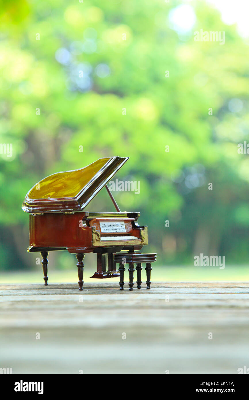 Miniature piano in nature Stock Photo - Alamy