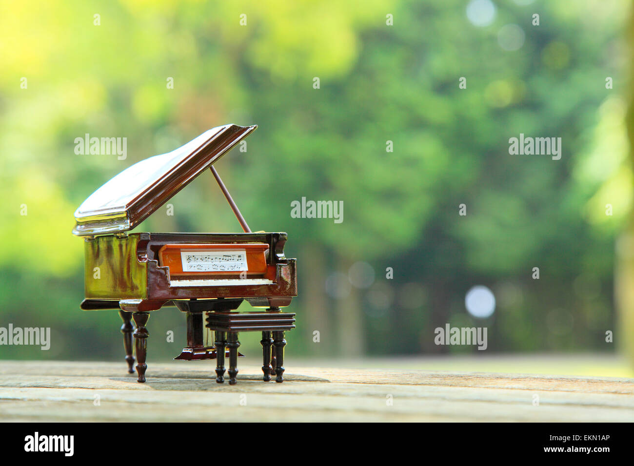 Miniature piano in nature Stock Photo - Alamy