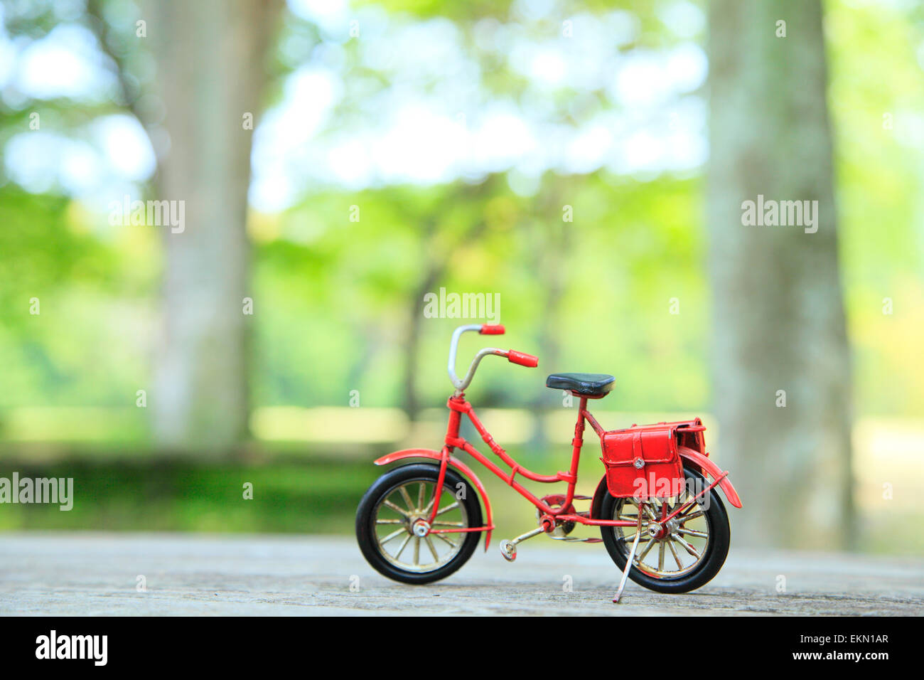 Miniature bicycle in nature Stock Photo - Alamy