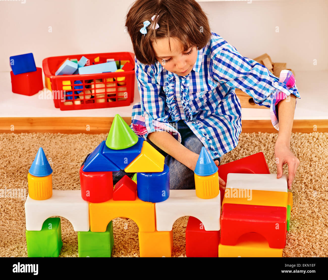 Child playing bricks Stock Photo - Alamy