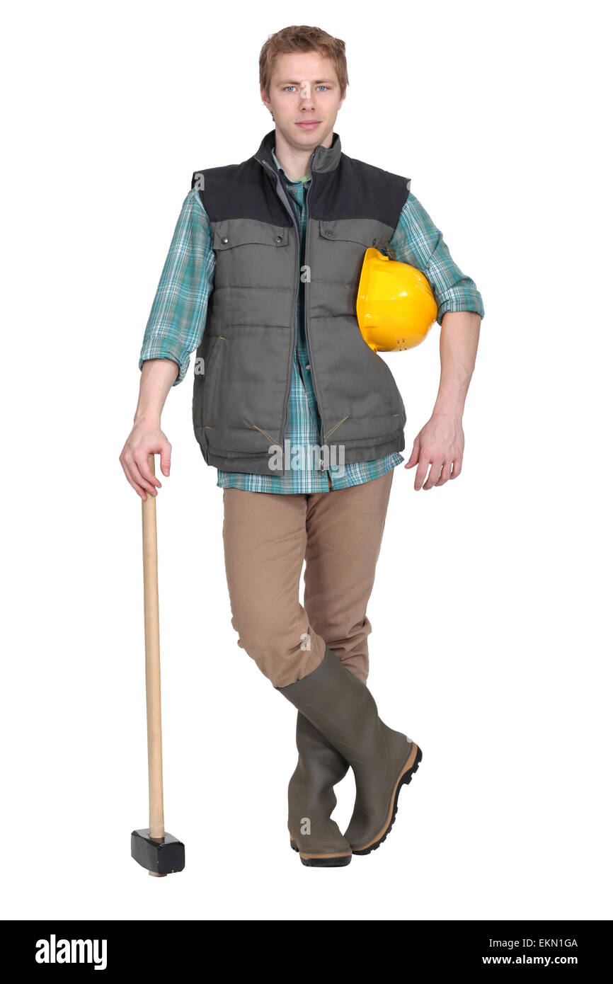 Man stood with sledge hammer Stock Photo - Alamy