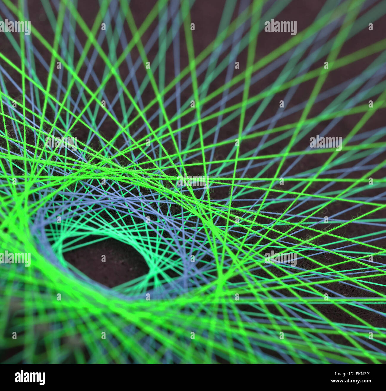 Display of colorful threads on a black panel Stock Photo - Alamy