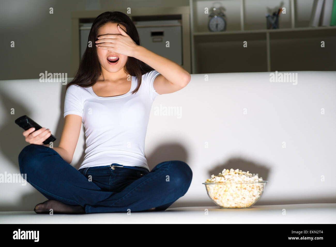 beautiful young girl watching TV Stock Photo - Alamy