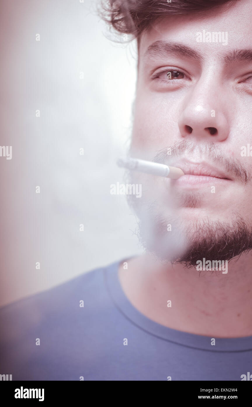 stylish young modern man with cigarette Stock Photo - Alamy