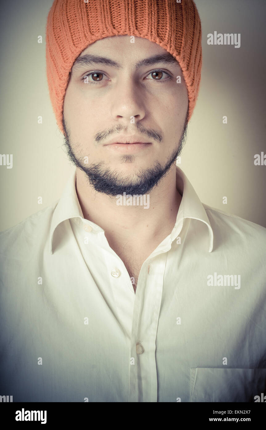 young modern stylish man with orange cap Stock Photo - Alamy