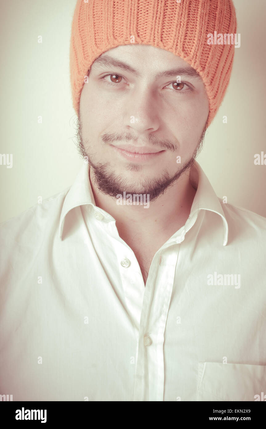 young modern stylish man with orange cap Stock Photo - Alamy