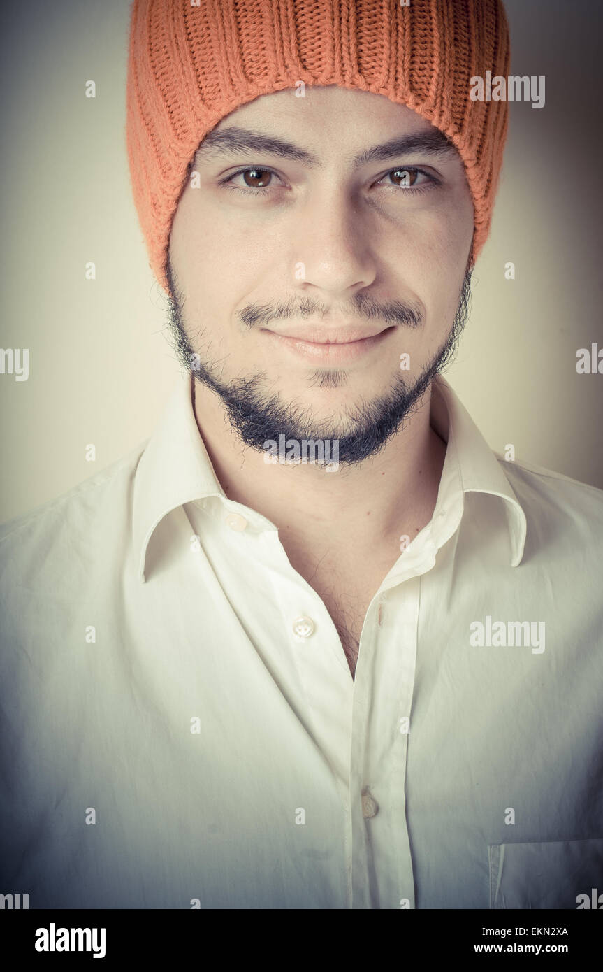 young modern stylish man with orange cap Stock Photo - Alamy