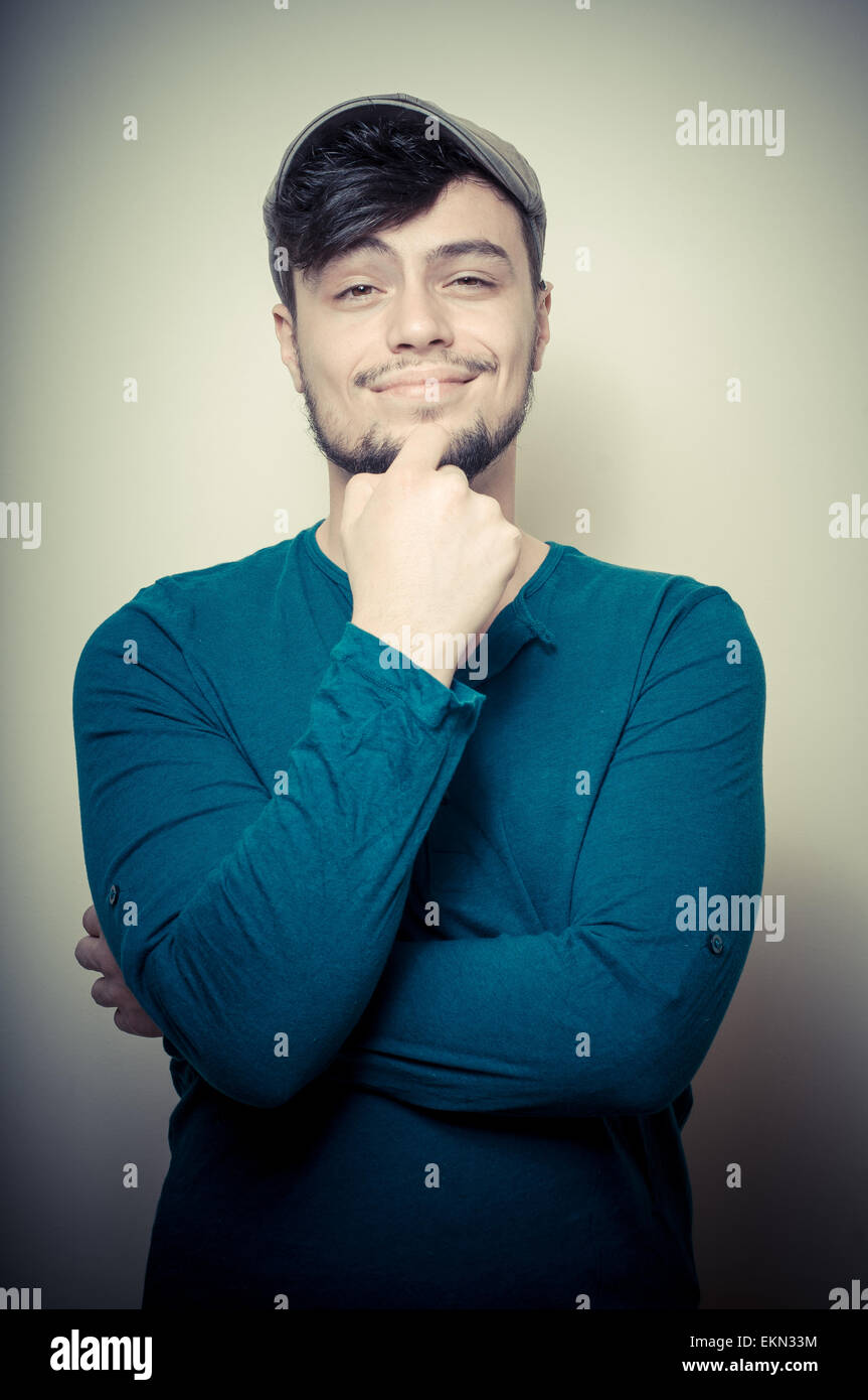 young modern stylish man with cap Stock Photo - Alamy