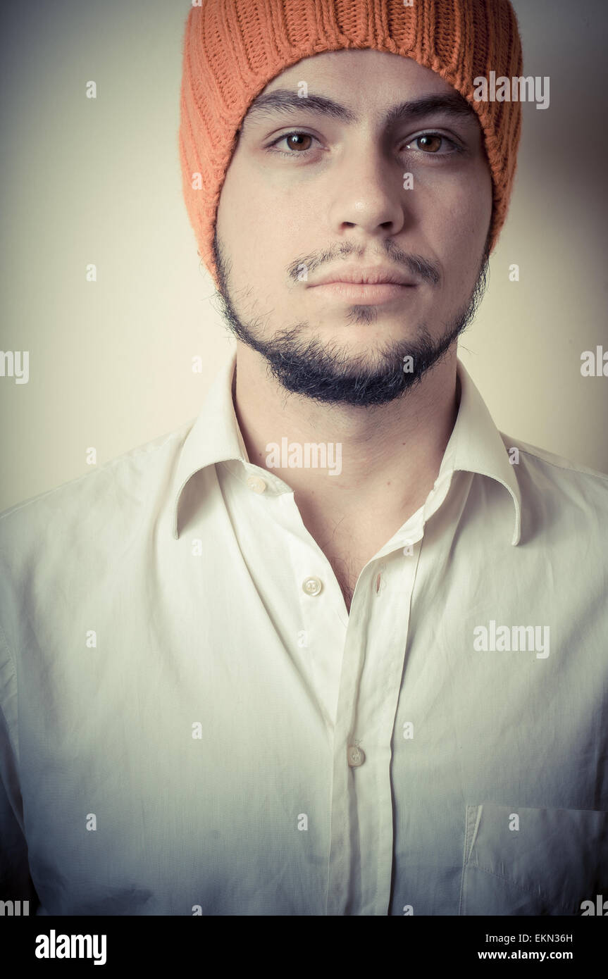 young modern stylish man with orange cap Stock Photo - Alamy