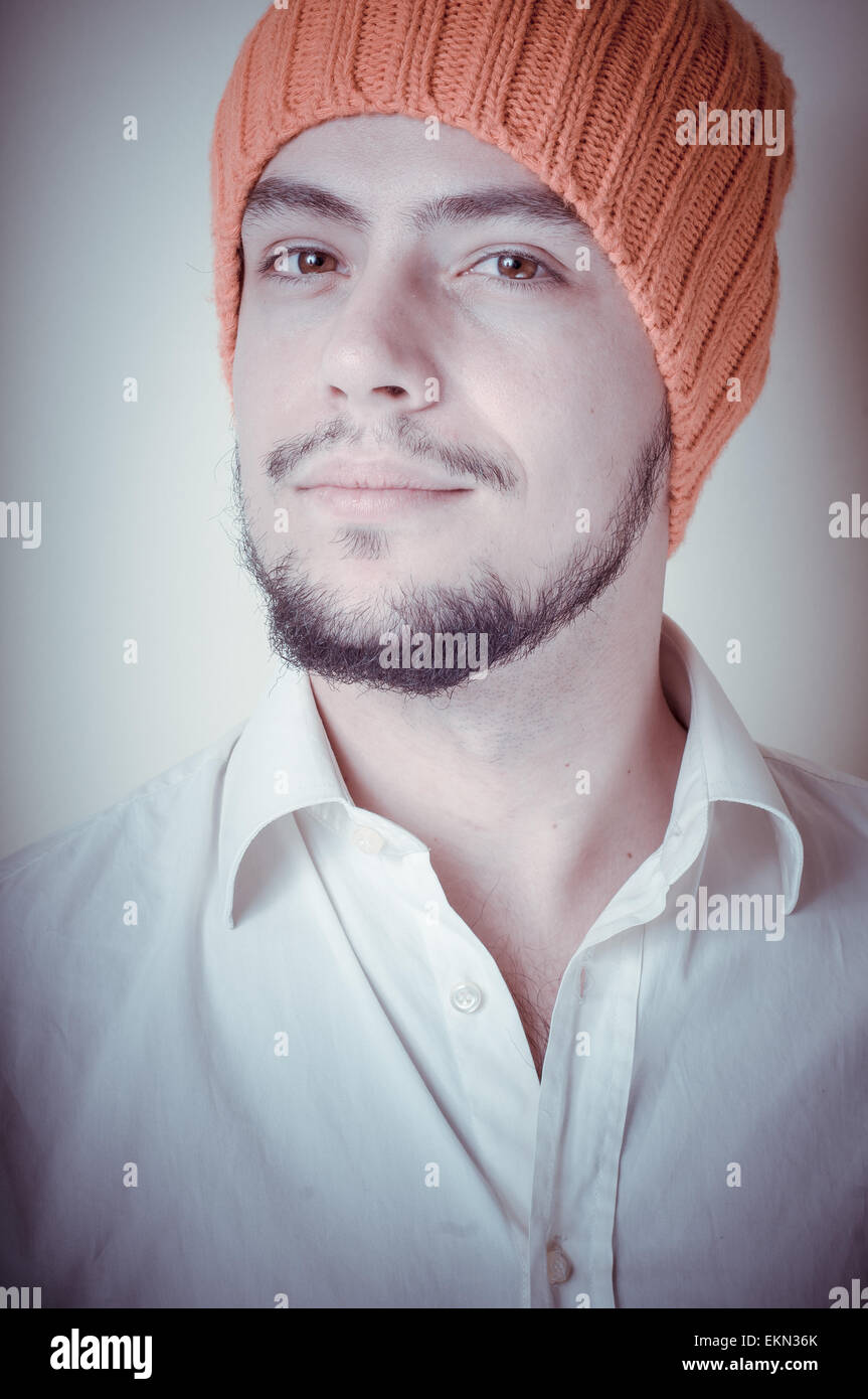 young modern stylish man with orange cap Stock Photo - Alamy