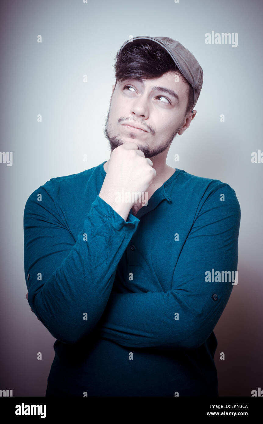 young modern stylish man with cap Stock Photo - Alamy
