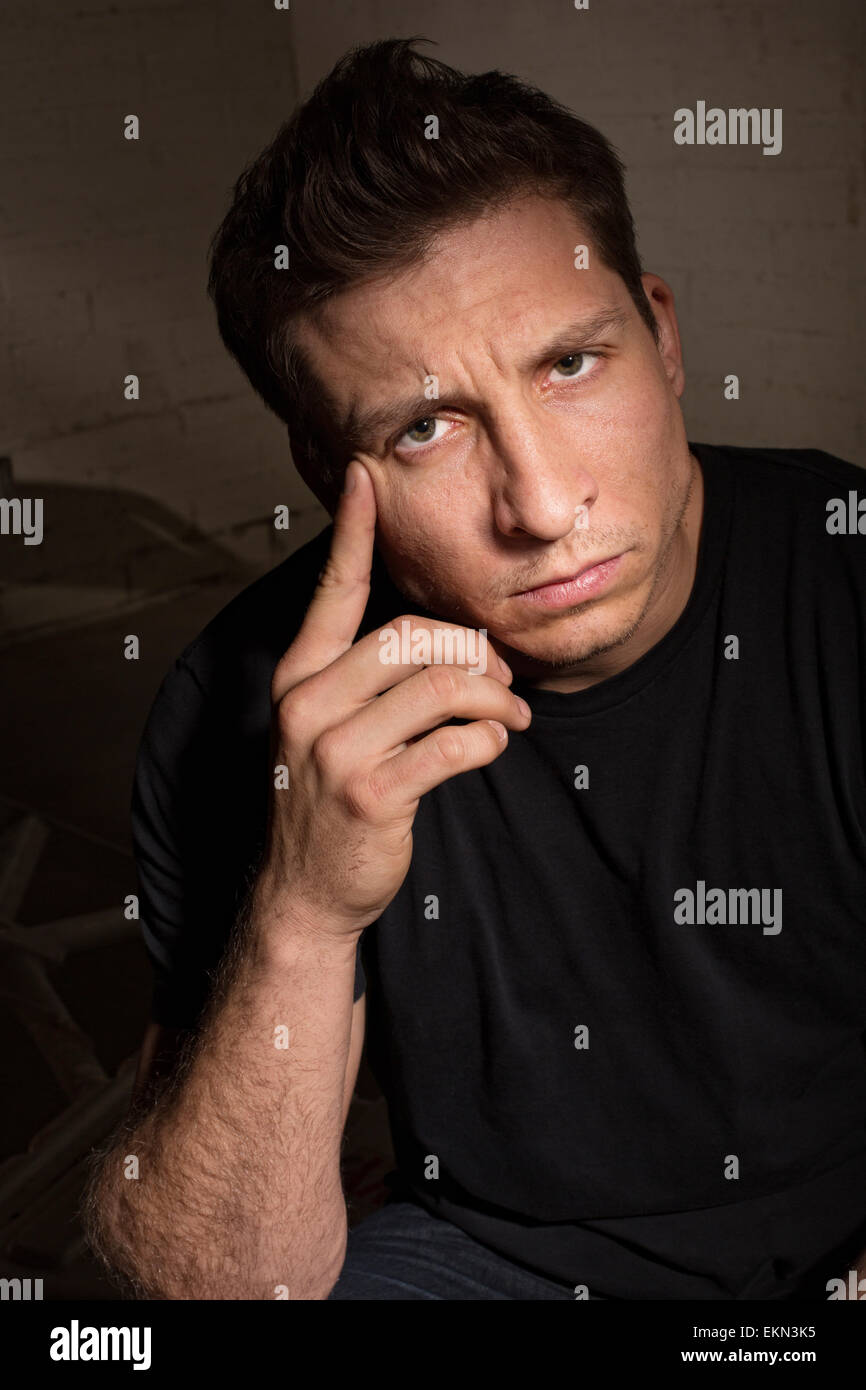 Serious Man in Black Stock Photo - Alamy