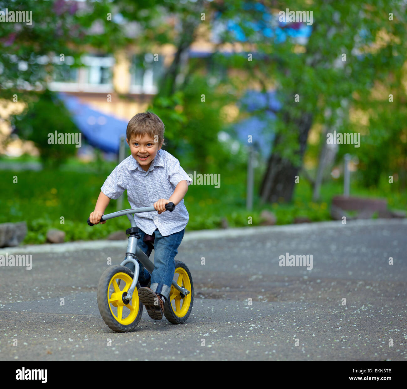 Little boy on a bicycle Stock Photo - Alamy
