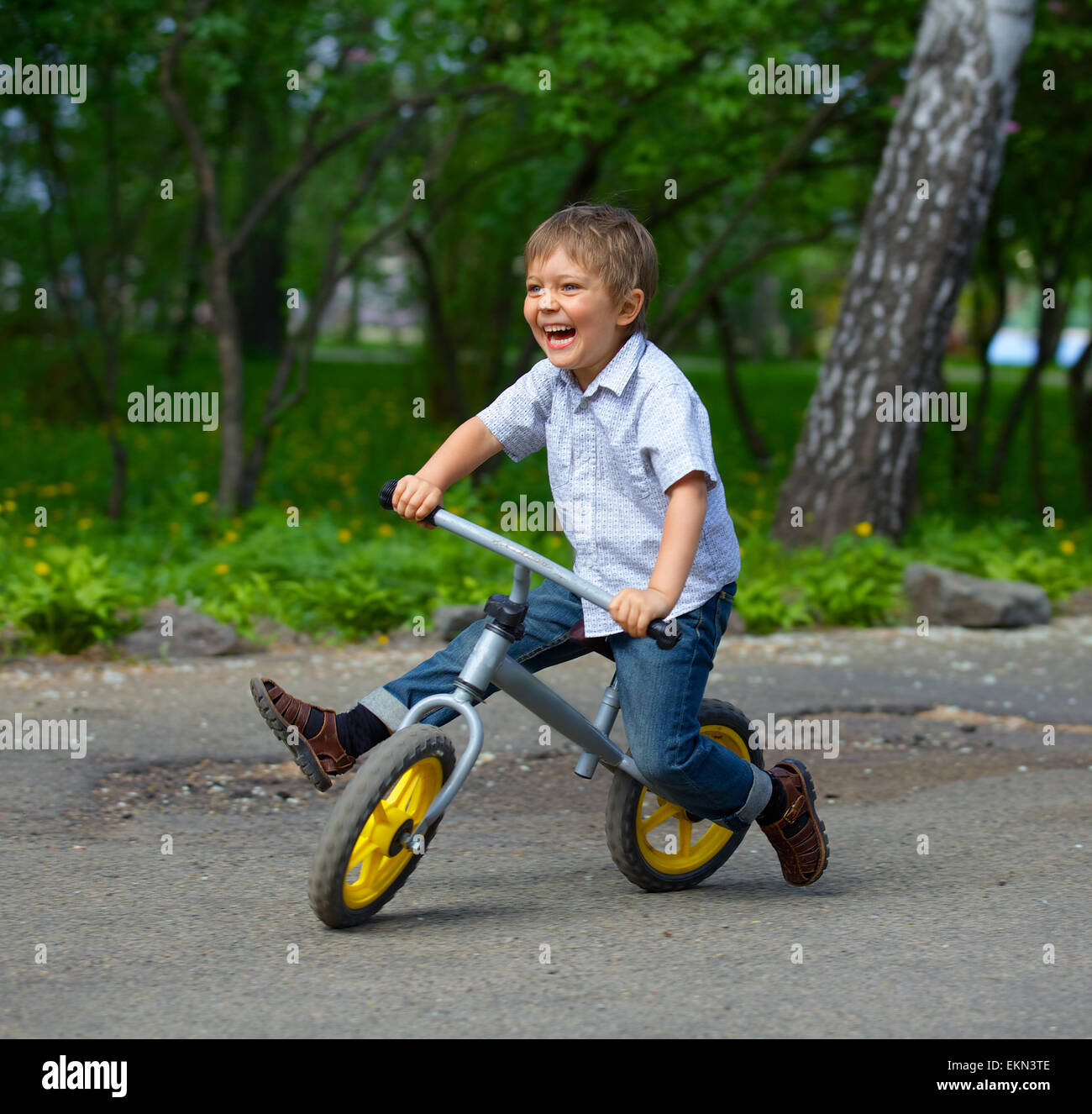 Little boy on a bicycle Stock Photo - Alamy