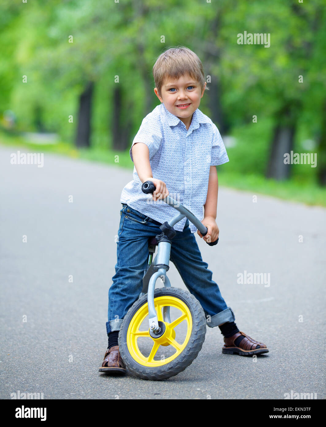 Little boy on a bicycle Stock Photo - Alamy
