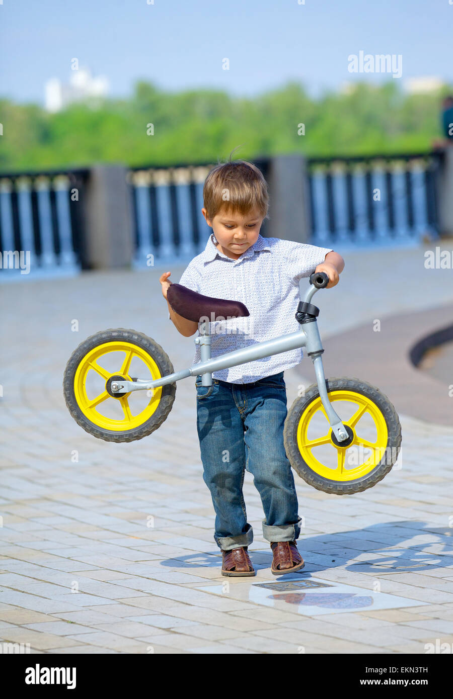 Little boy on a bicycle Stock Photo - Alamy