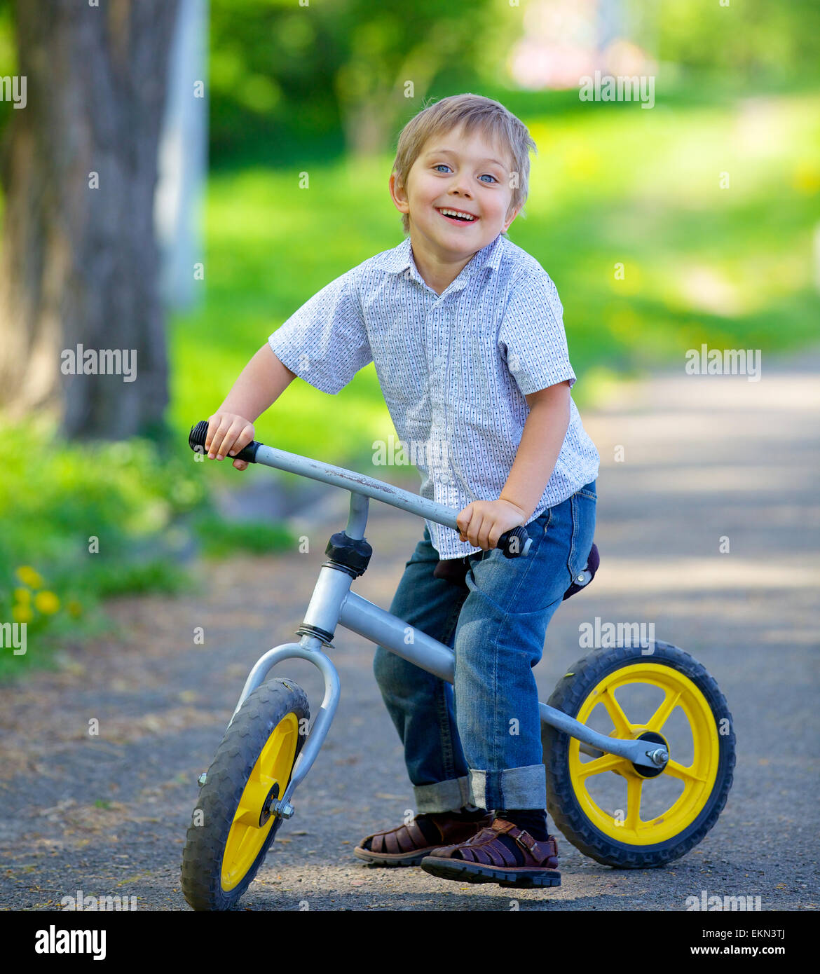 Little boy on a bicycle Stock Photo - Alamy