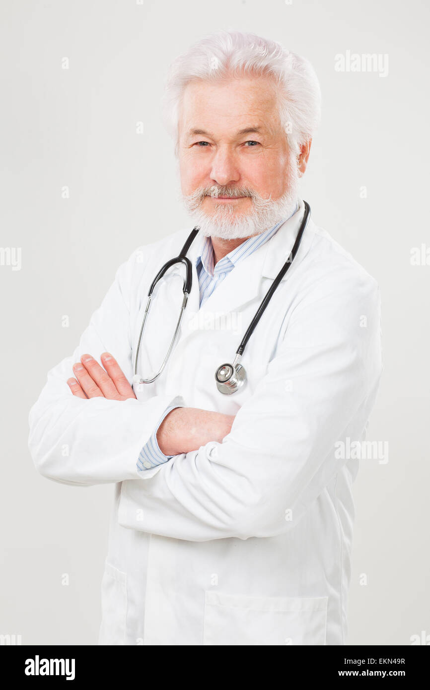 Handsome elderly doctor in uniform hi-res stock photography and images ...