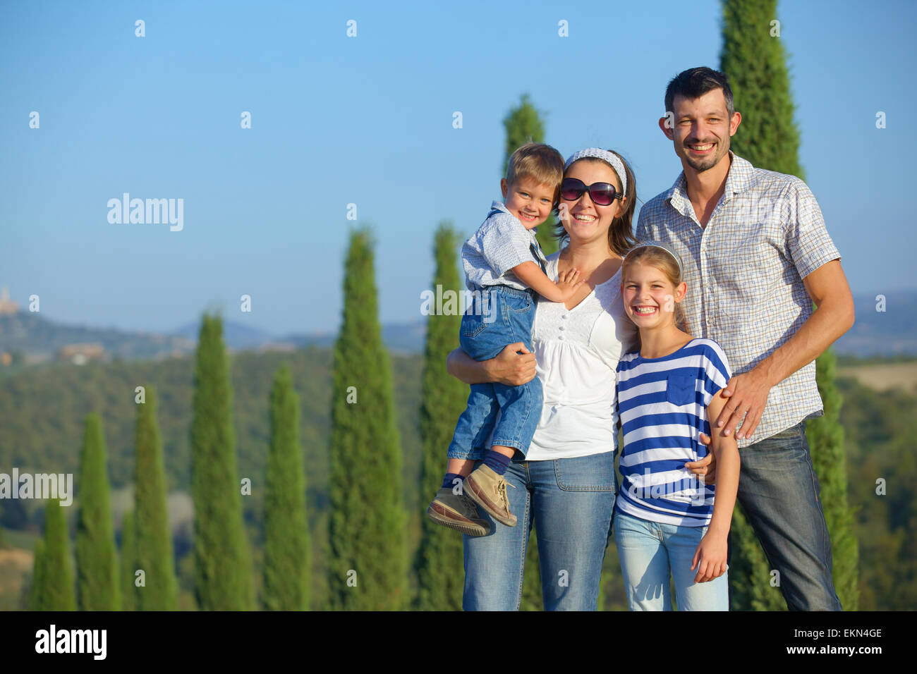 Happy family in Tuscan Stock Photo - Alamy