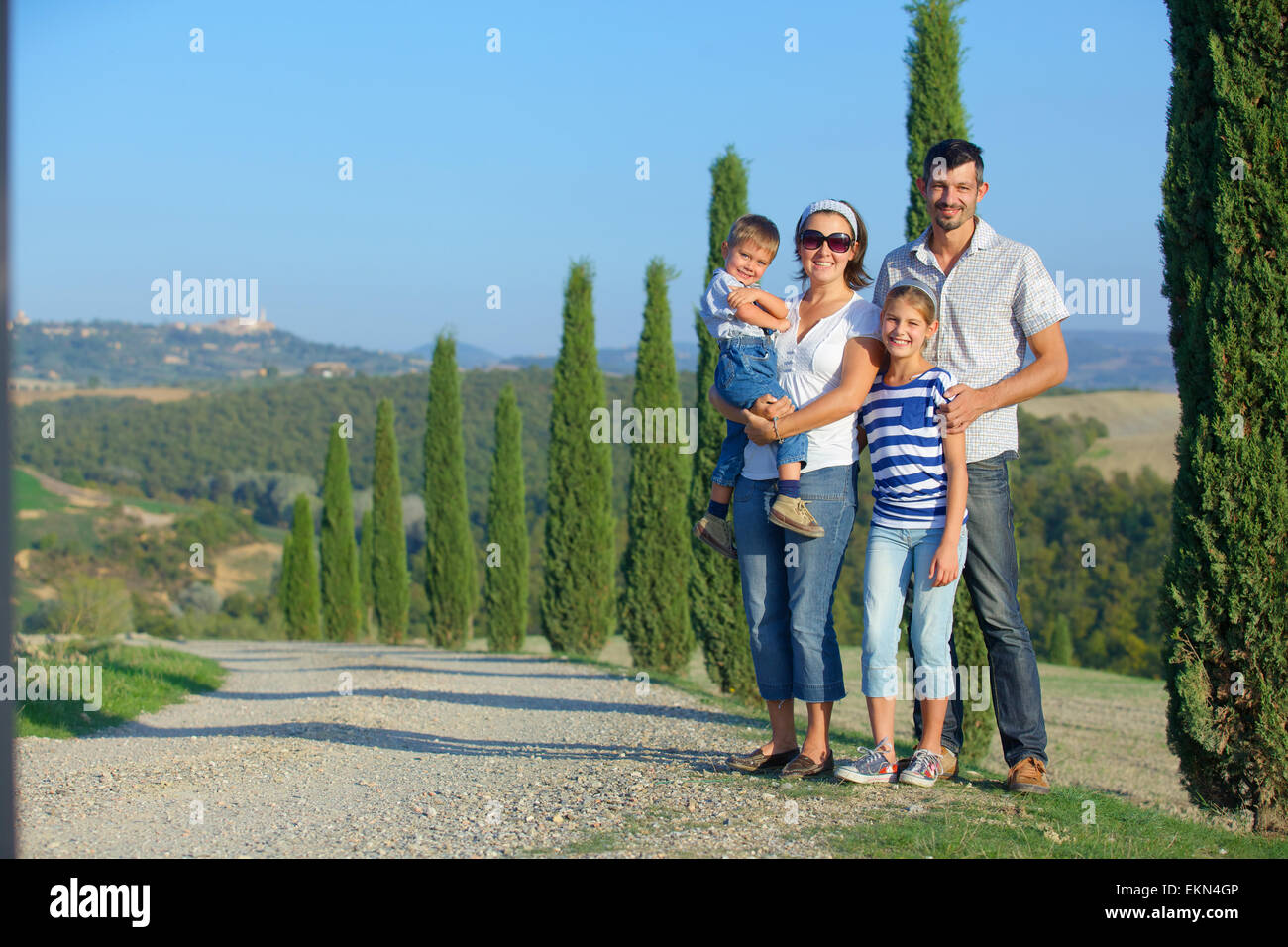 Happy family in Tuscan Stock Photo - Alamy
