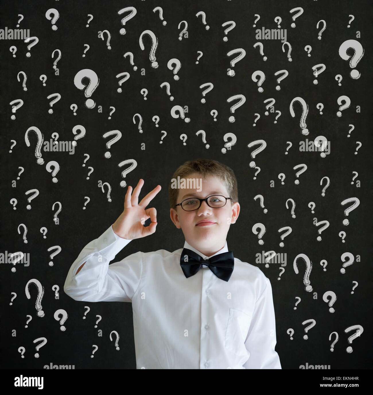 All ok or okay sign boy dressed up as business man with chalk questions ...
